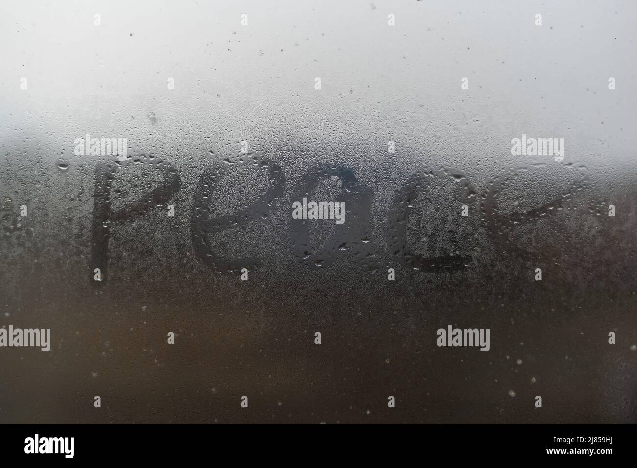 word peace on a foggy window Stock Photo - Alamy