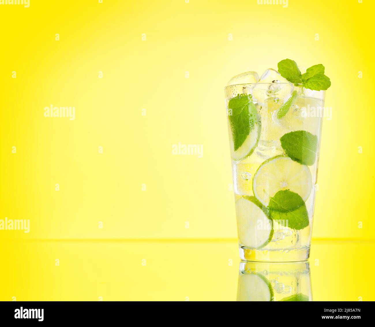 Mojito cocktail on yellow background with copy space Stock Photo - Alamy