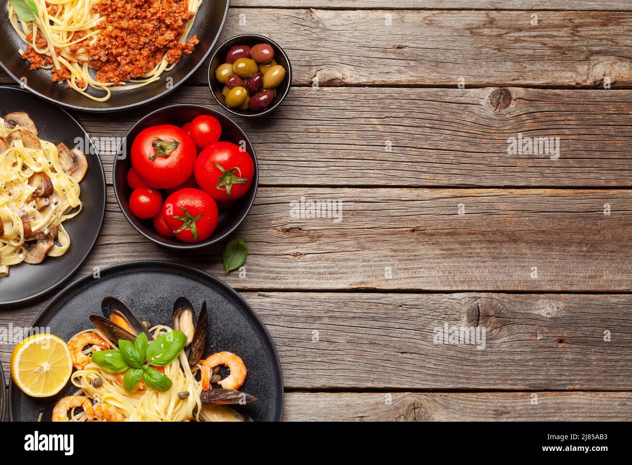 Various Italian pasta. Seafood, mushroom and tomato sauce pasta ...