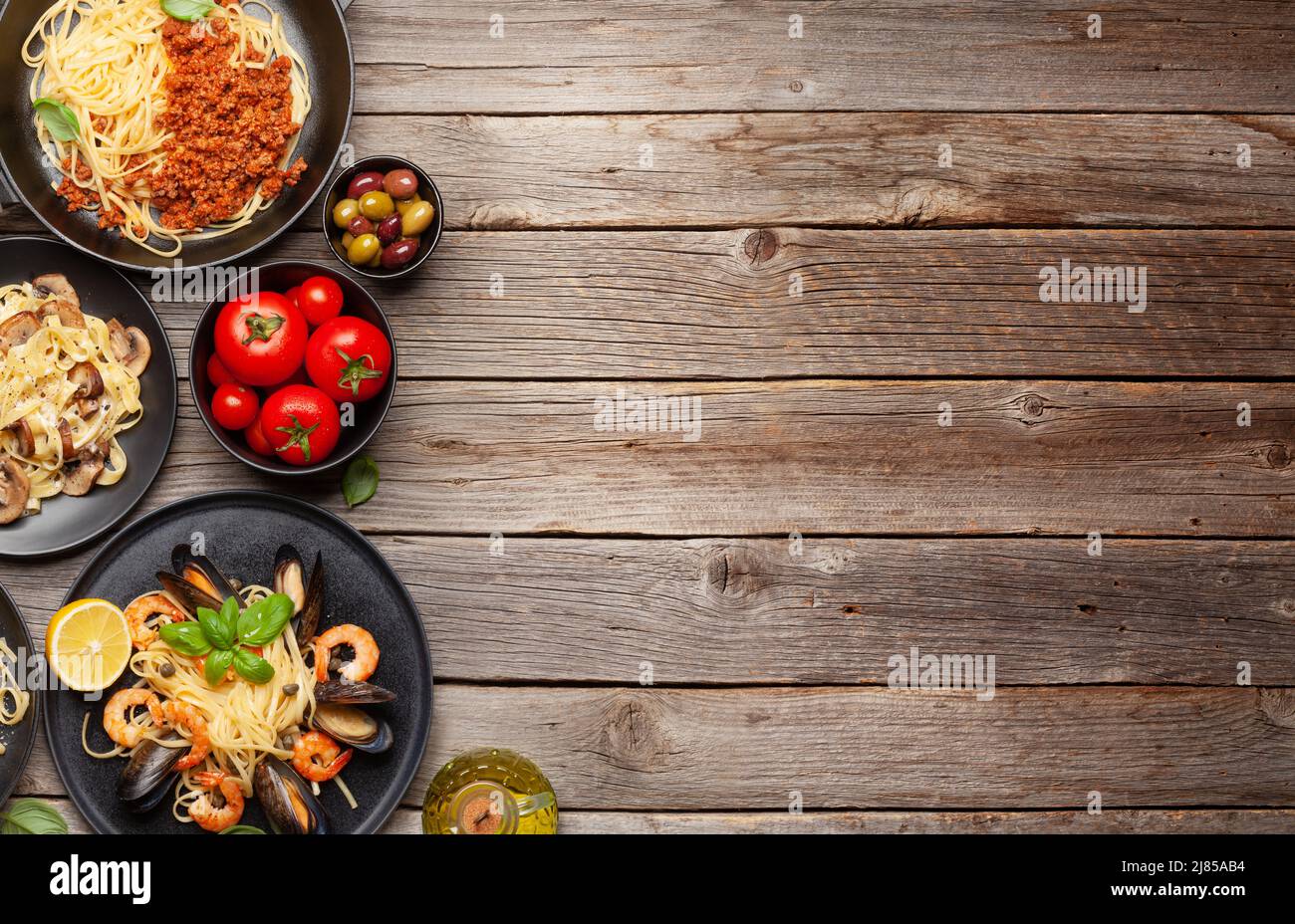 Various Italian pasta. Seafood, mushroom and tomato sauce pasta ...