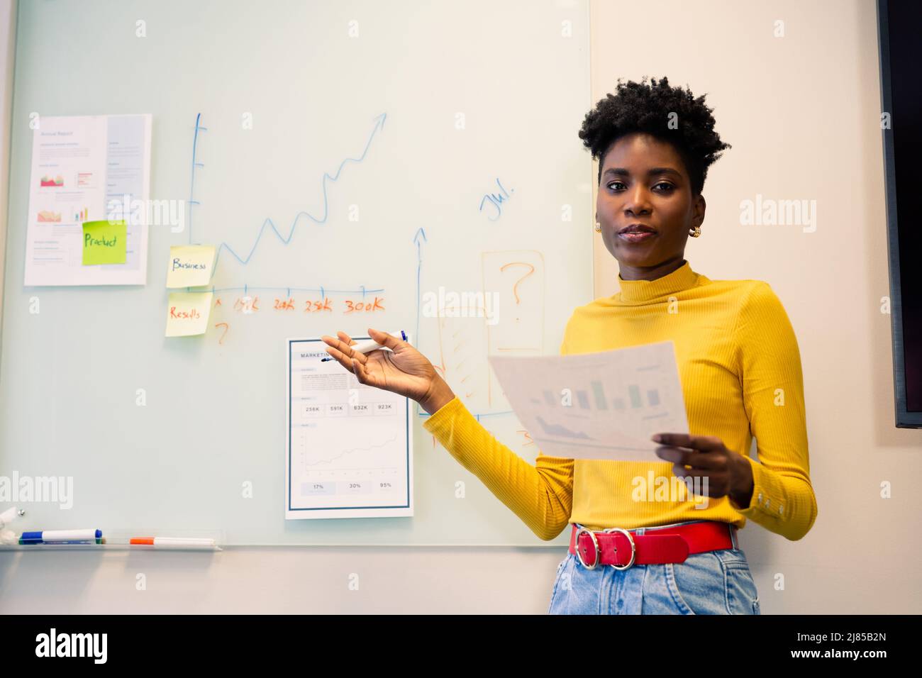 Portrait of young african american businesswoman explaining strategy ...