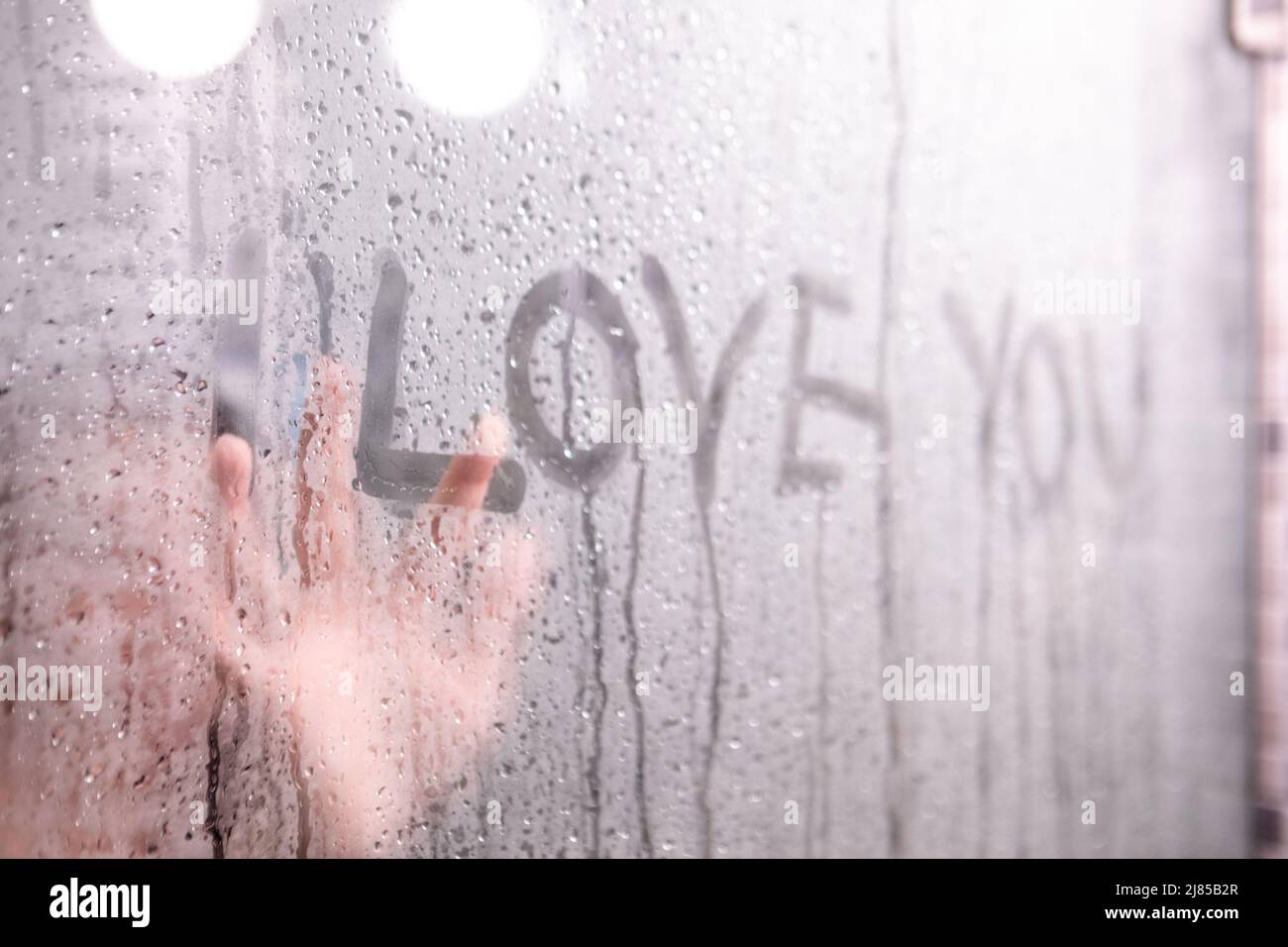 text I love you on shower glass copy space Stock Photo - Alamy