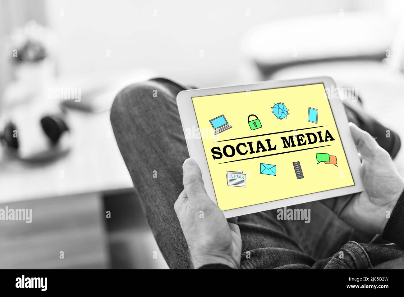 Tablet screen displaying a social media concept Stock Photo - Alamy