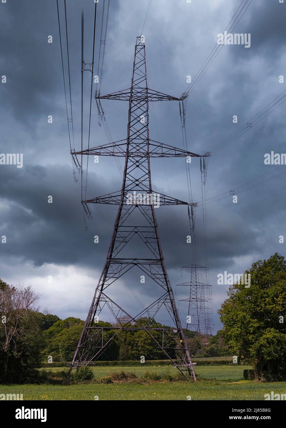 Power cable pylons in the Sussex countryside Stock Photo - Alamy