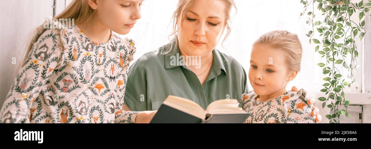 happy family mother with cute little kids daughters girls have fun ...