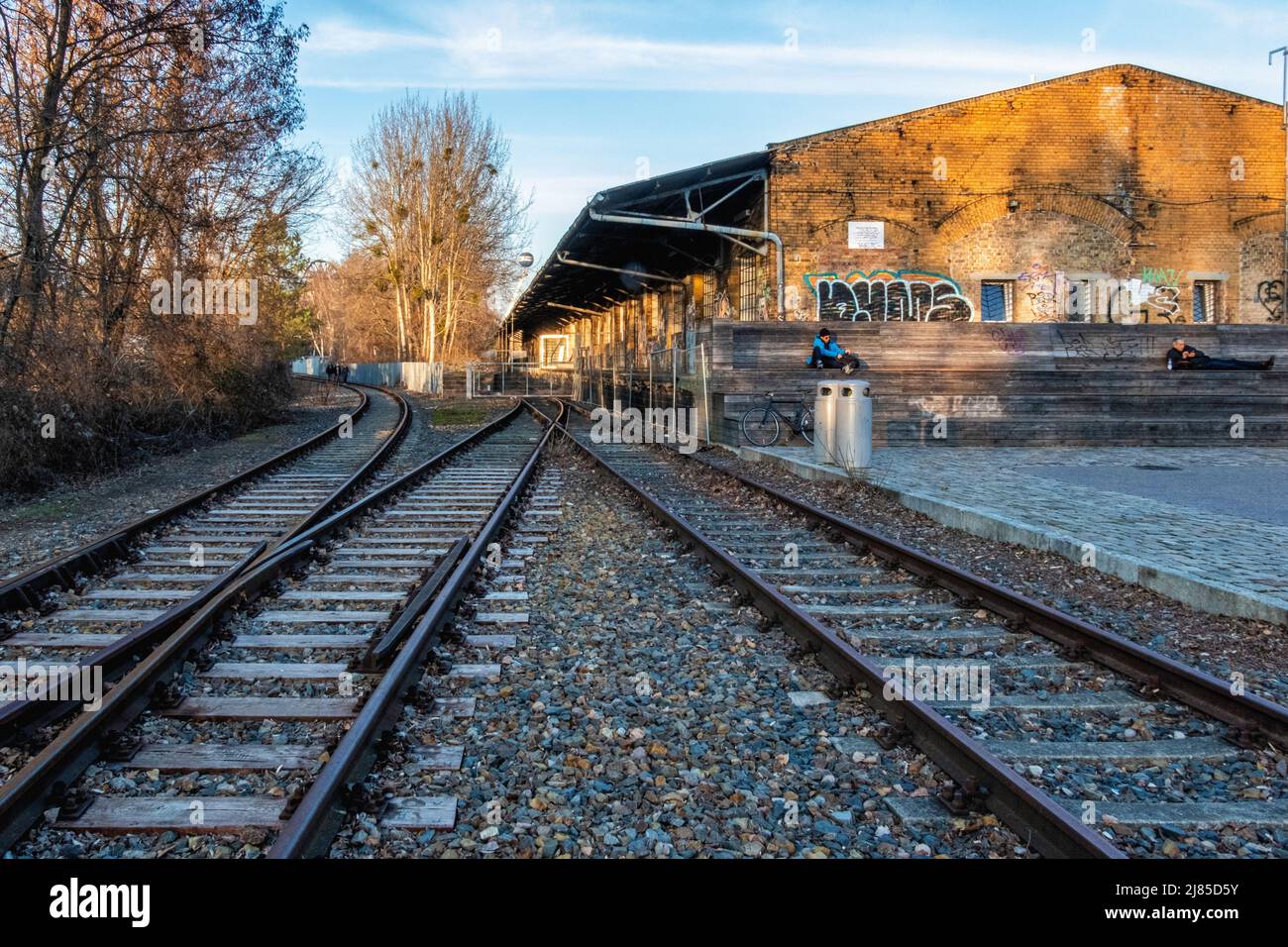 Former freight yard building and old rail tracks in grounds of ...