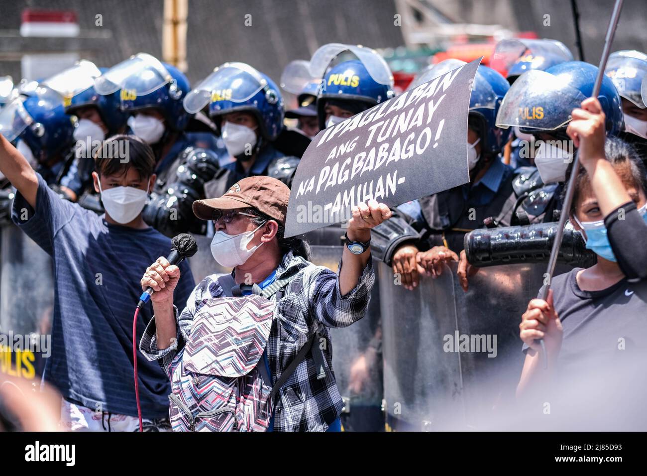 Pasay, Metro Manila, Philippines. 13th May, 2022. Protesters in front ...