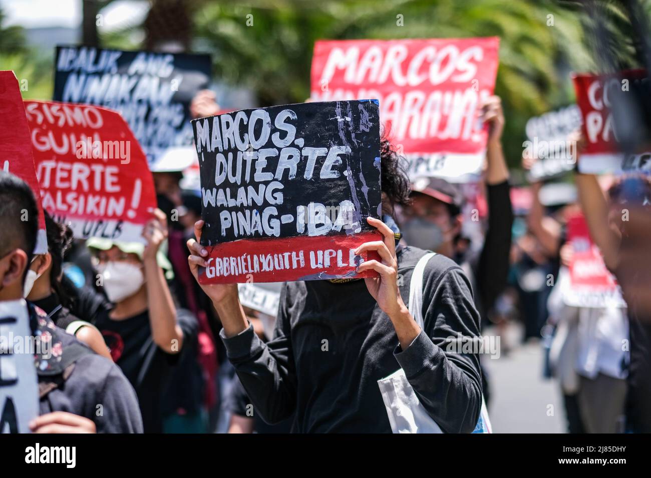 Pasay, Metro Manila, Philippines. 13th May, 2022. Protesters in front ...