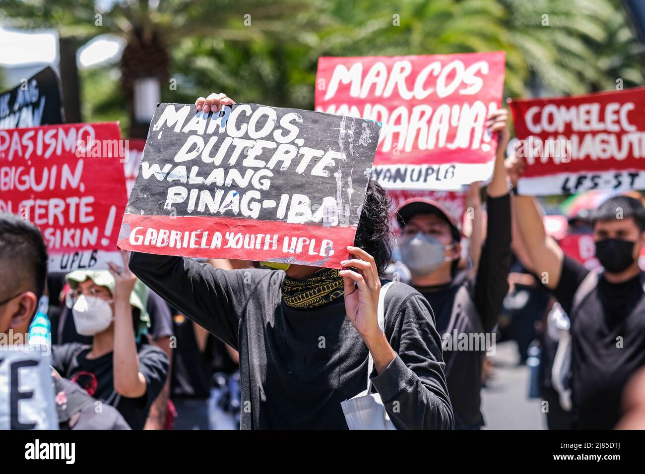 Pasay, Metro Manila, Philippines. 13th May, 2022. Protesters in front ...