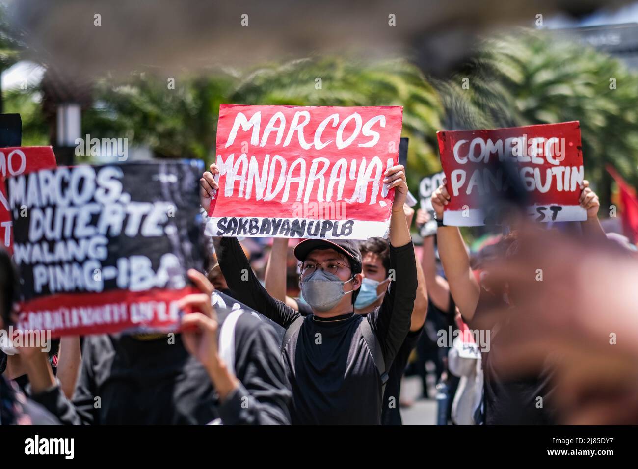 Pasay, Metro Manila, Philippines. 13th May, 2022. Protesters in front ...