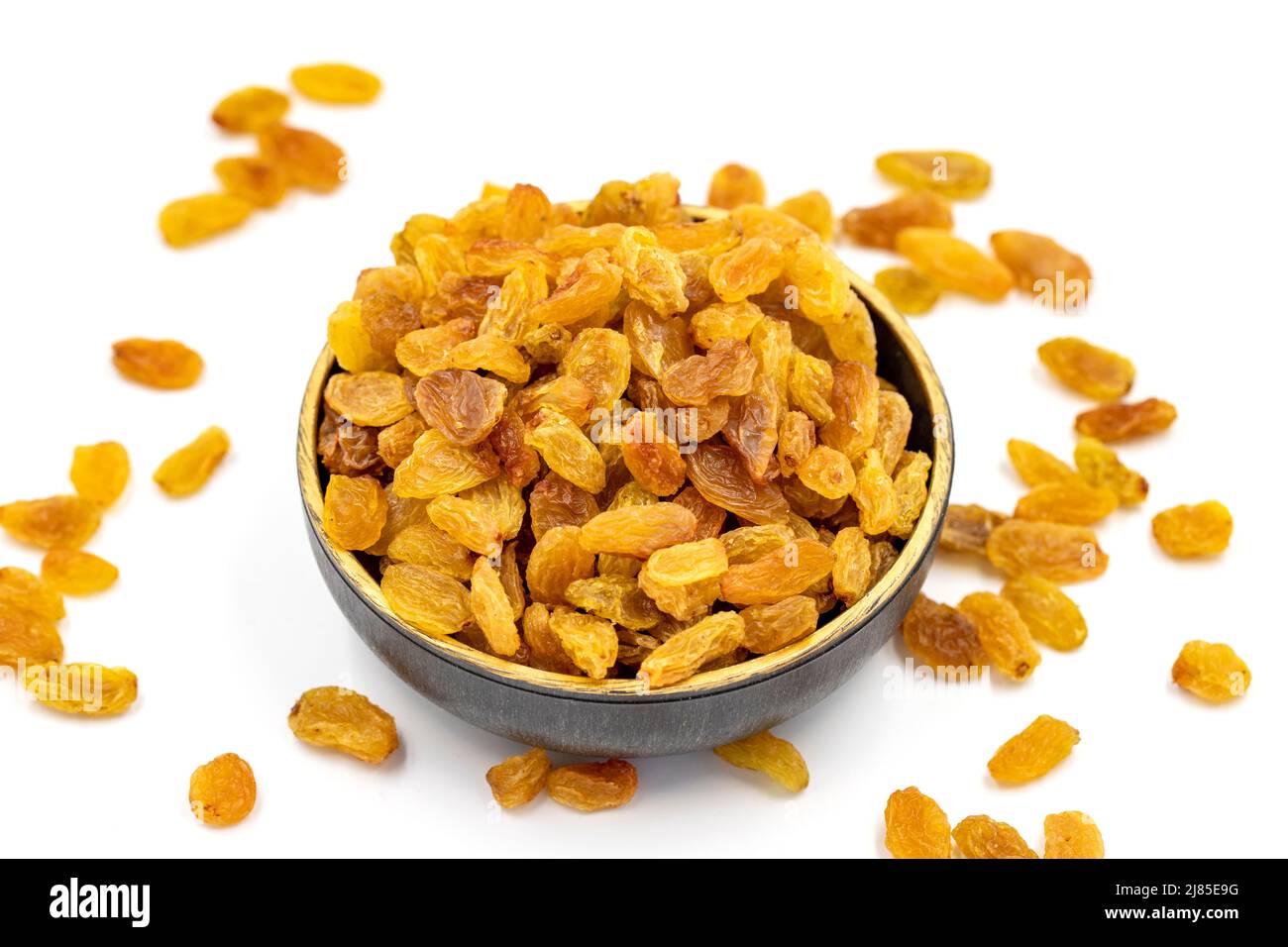 Dried raisins on a white background. Healthy and fresh nuts. Close-up ...