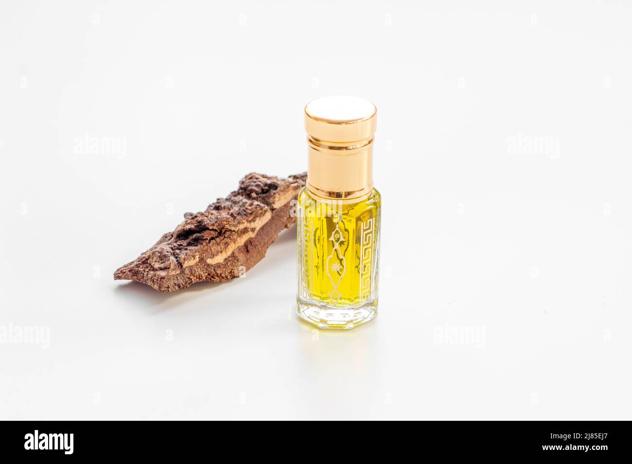 Arabic perfume Oud oil in glass bottle, close up. Aromatic Arabian oil ...