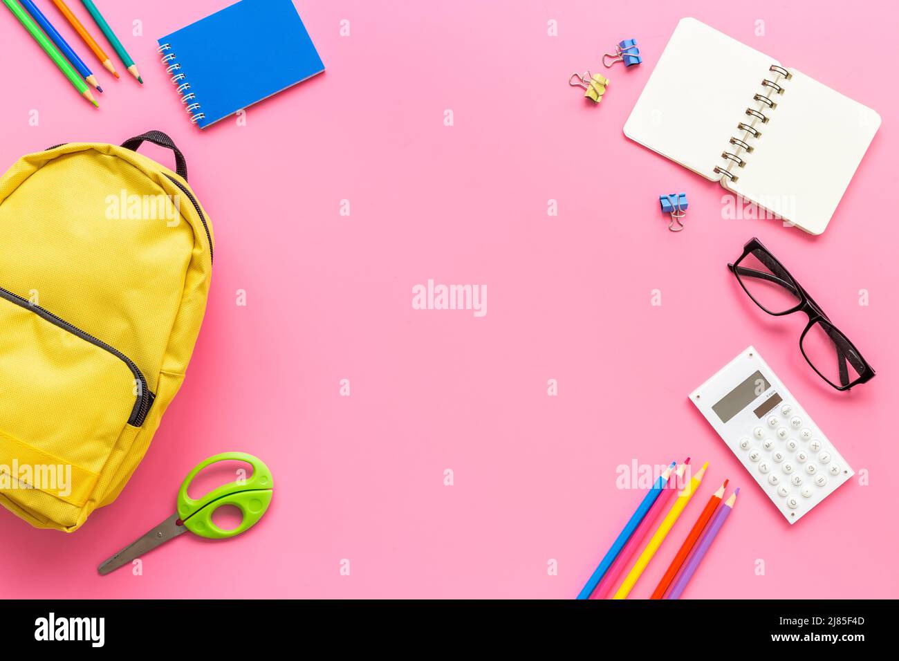 School backpack with school items and students equipment, top view ...