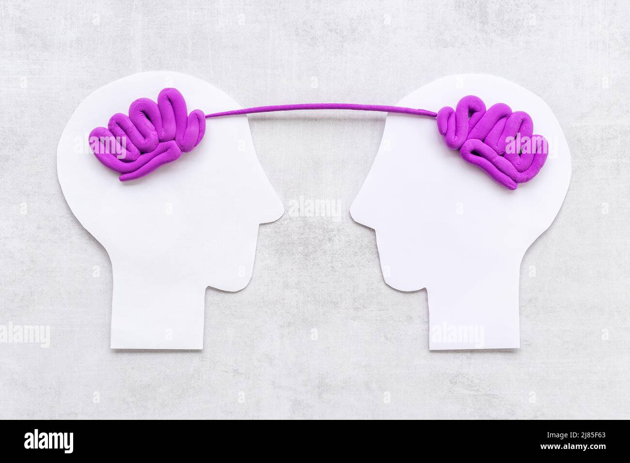 Teamwork concept, brain storm. Communication between two paper human ...