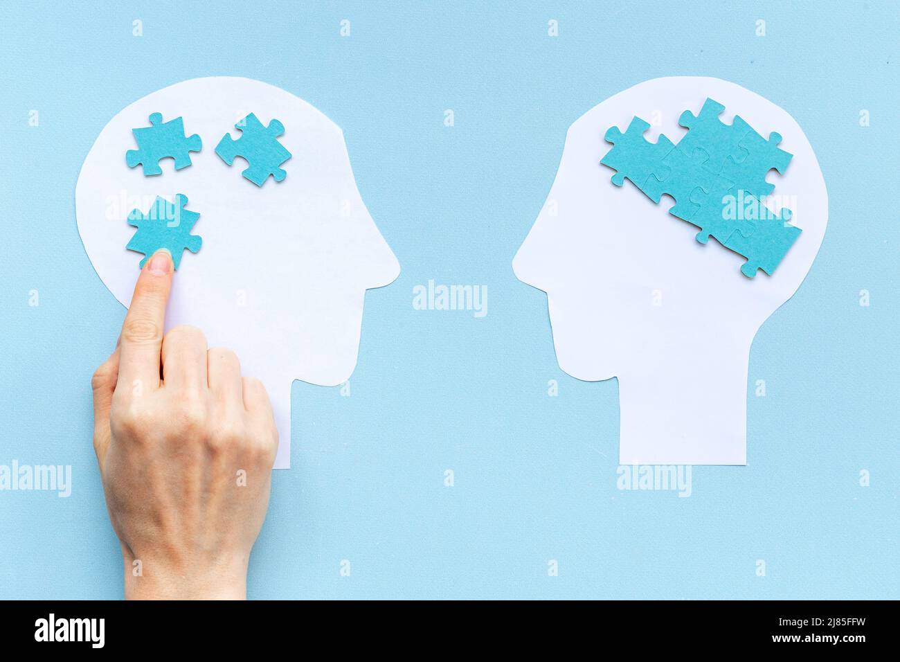 Social communication and connection concept with two paper human heads ...