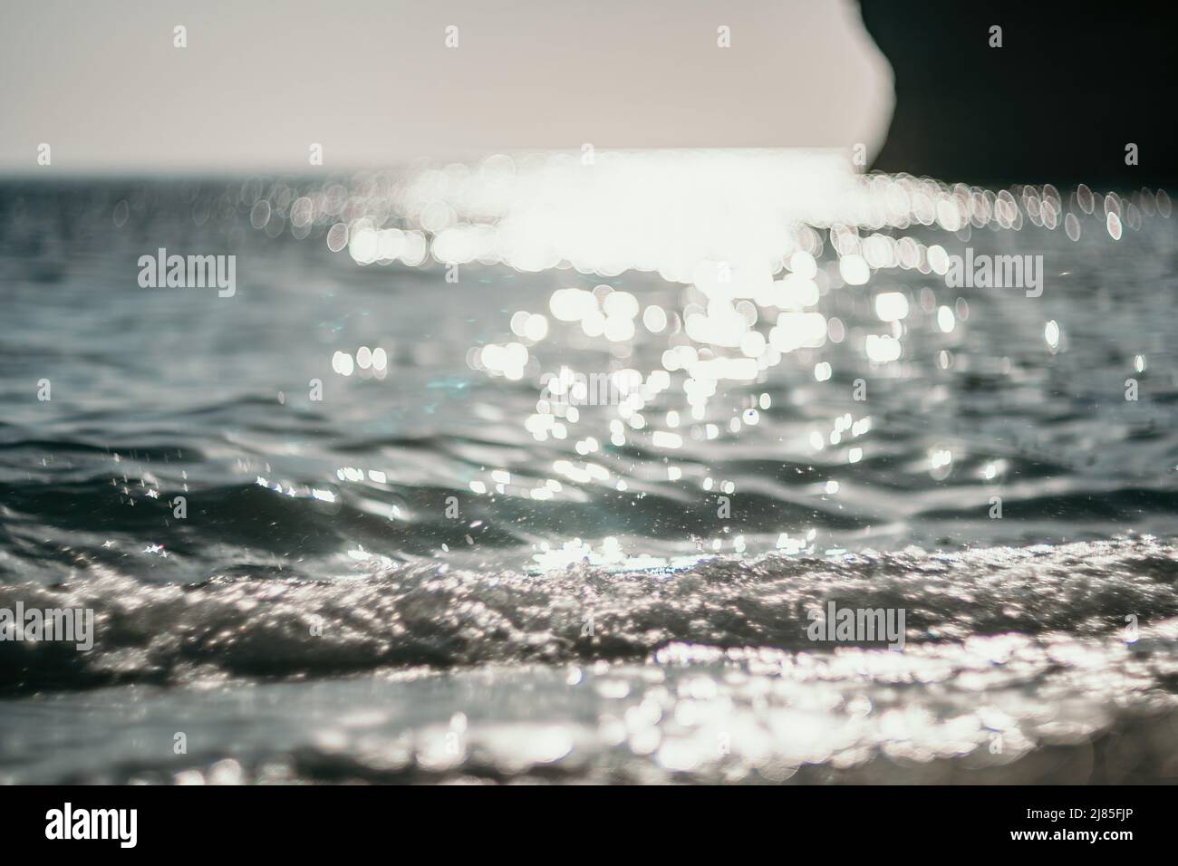 Abstract nature summer ocean sunset sea background. Small waves on ...