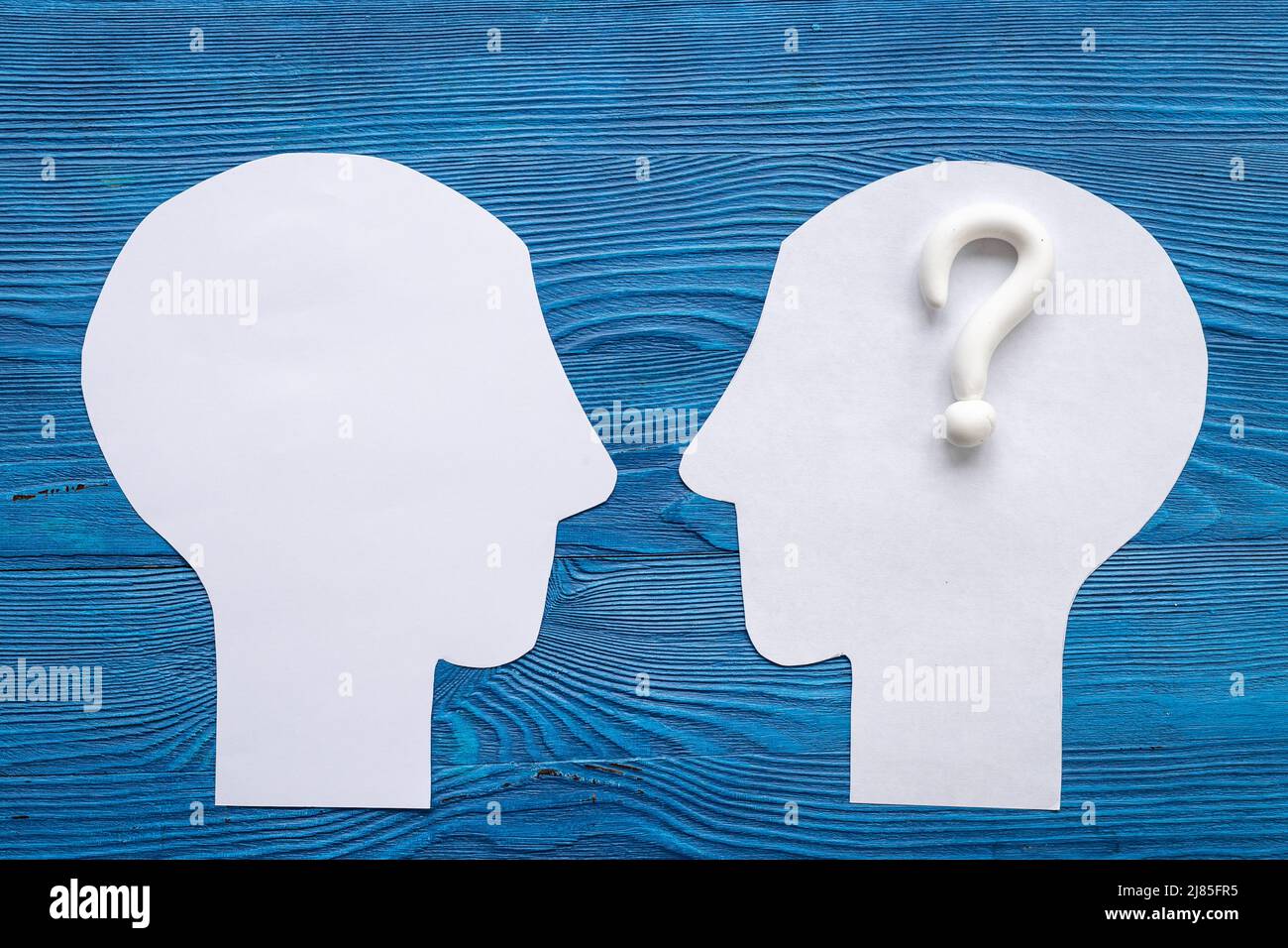 Question mark sign with paper human head. FAQ and help concept Stock ...