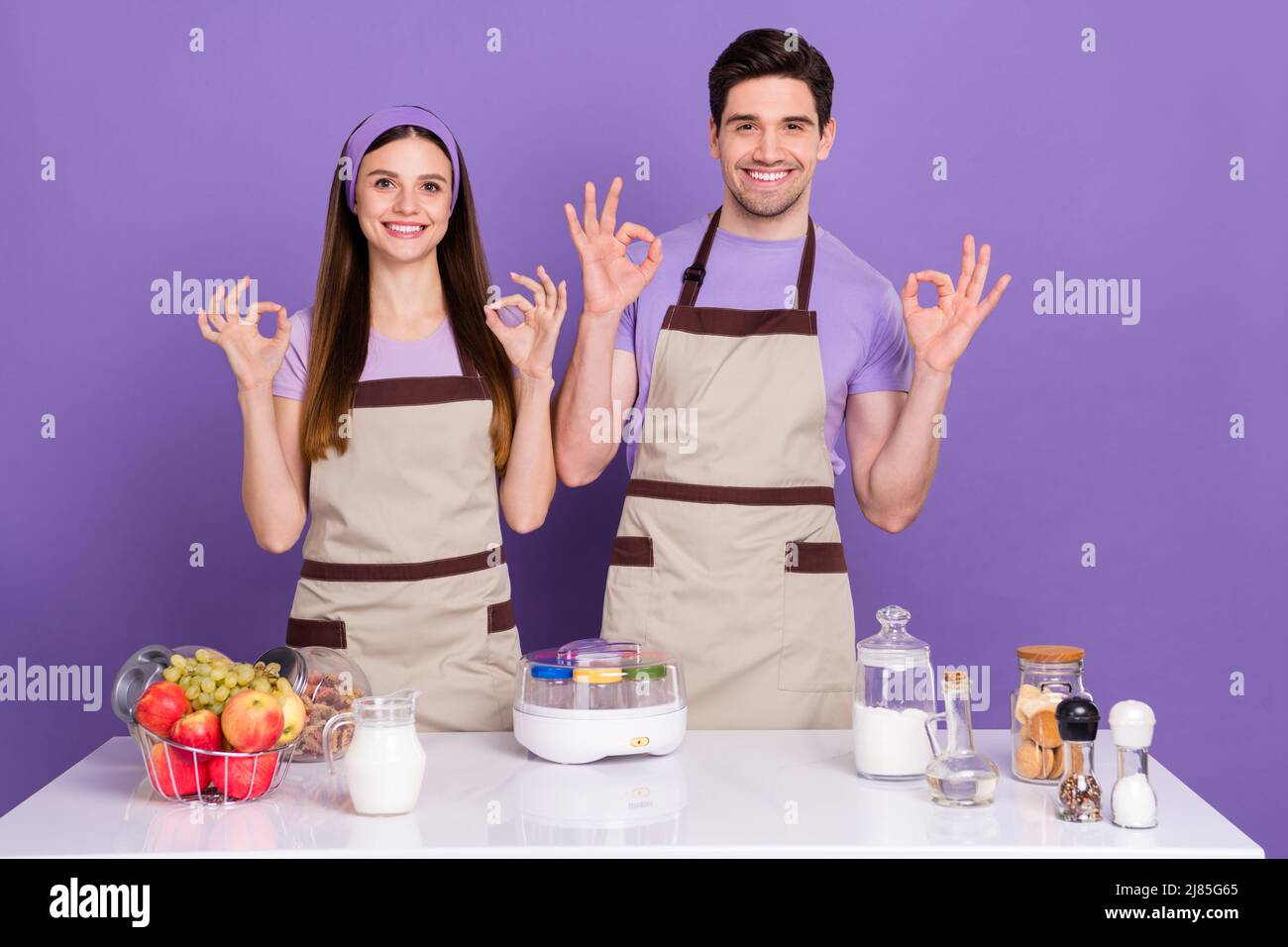 Photo of pretty sweet boyfriend girlfriend dressed chef showing okey ...