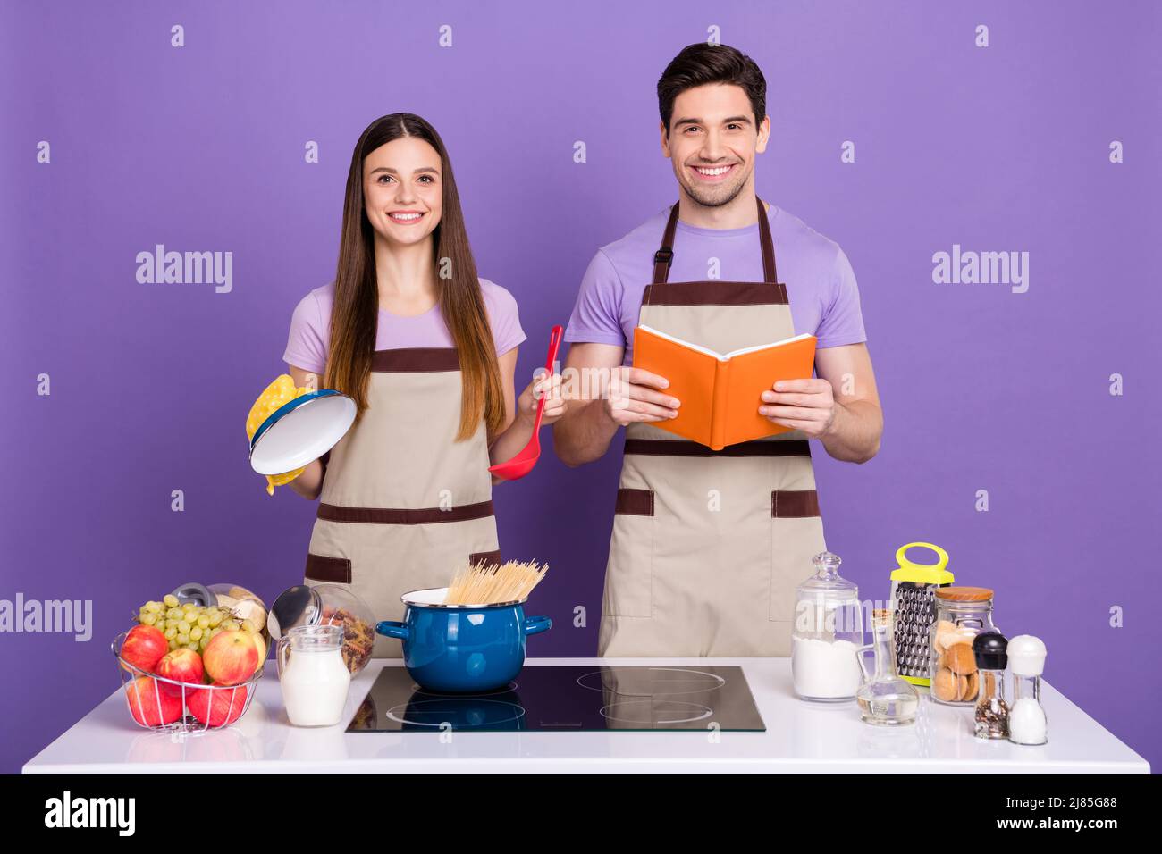 Photo of cheerful positive boyfriend girlfriend dressed chef outfit ...