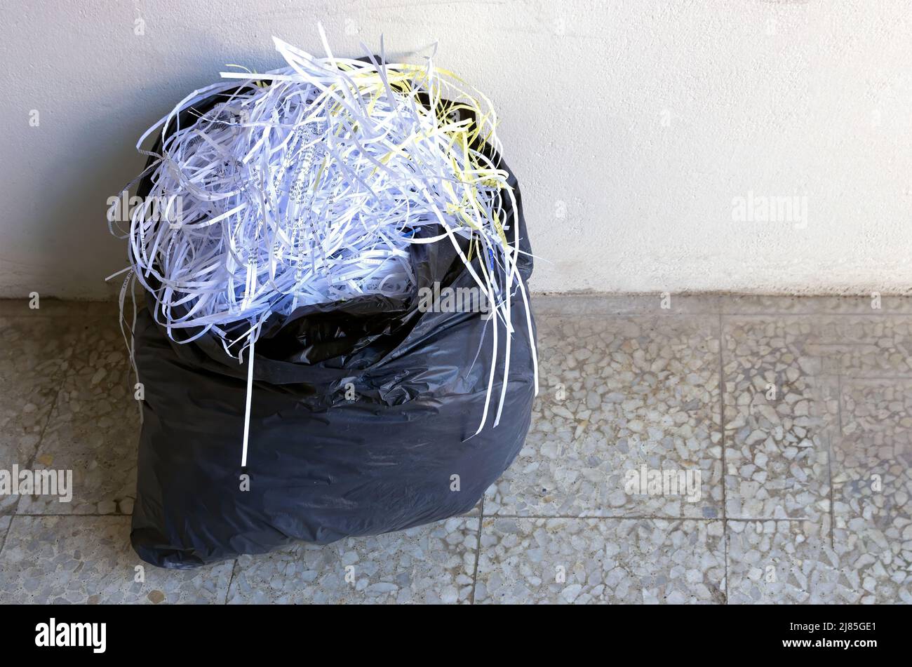 A large black sack with shredded paper for recycling Stock Photo - Alamy