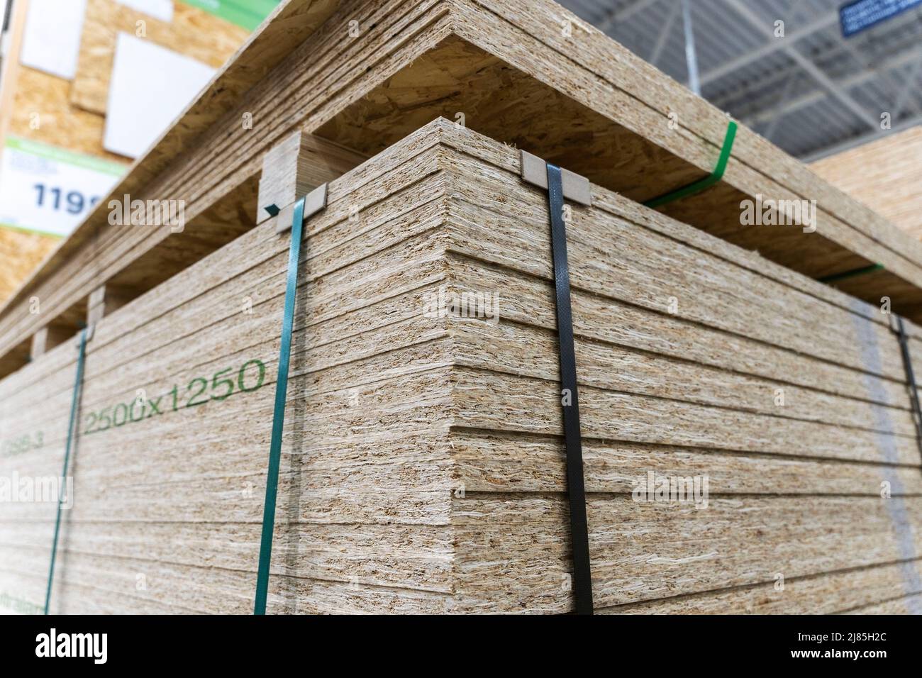 a stack of chipboard in a hardware store. wooden usb sheet Stock Photo ...