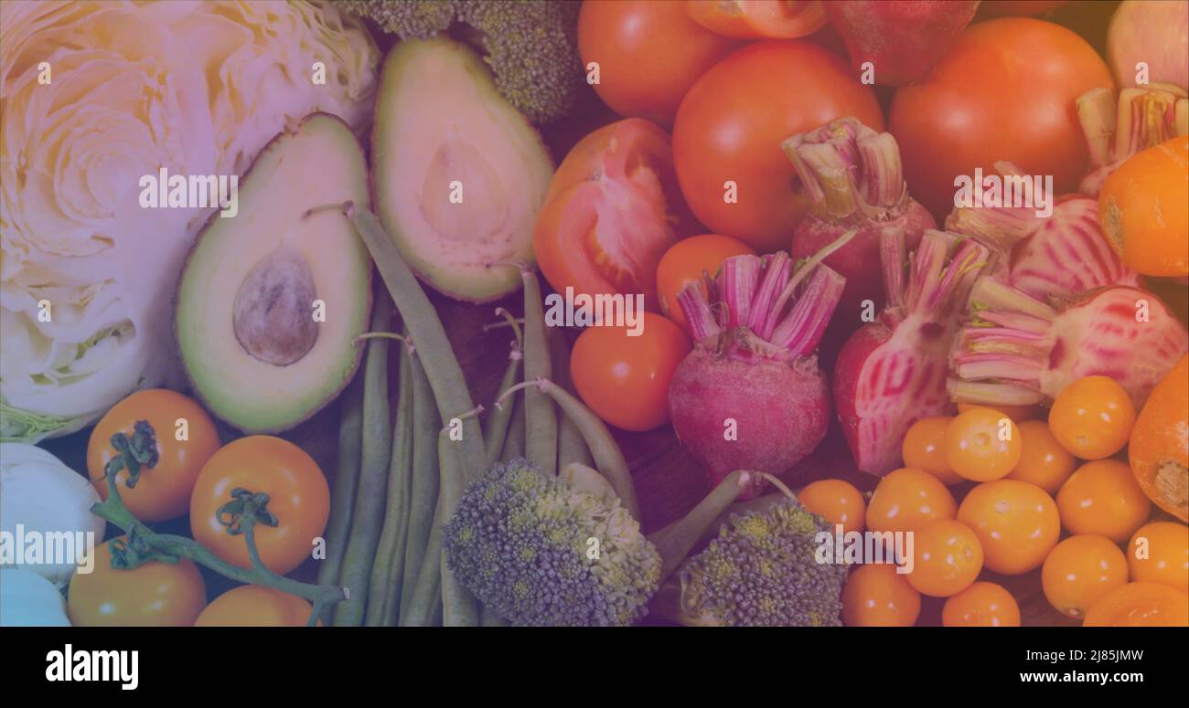 Image of green light bulb over vegetables Stock Photo - Alamy