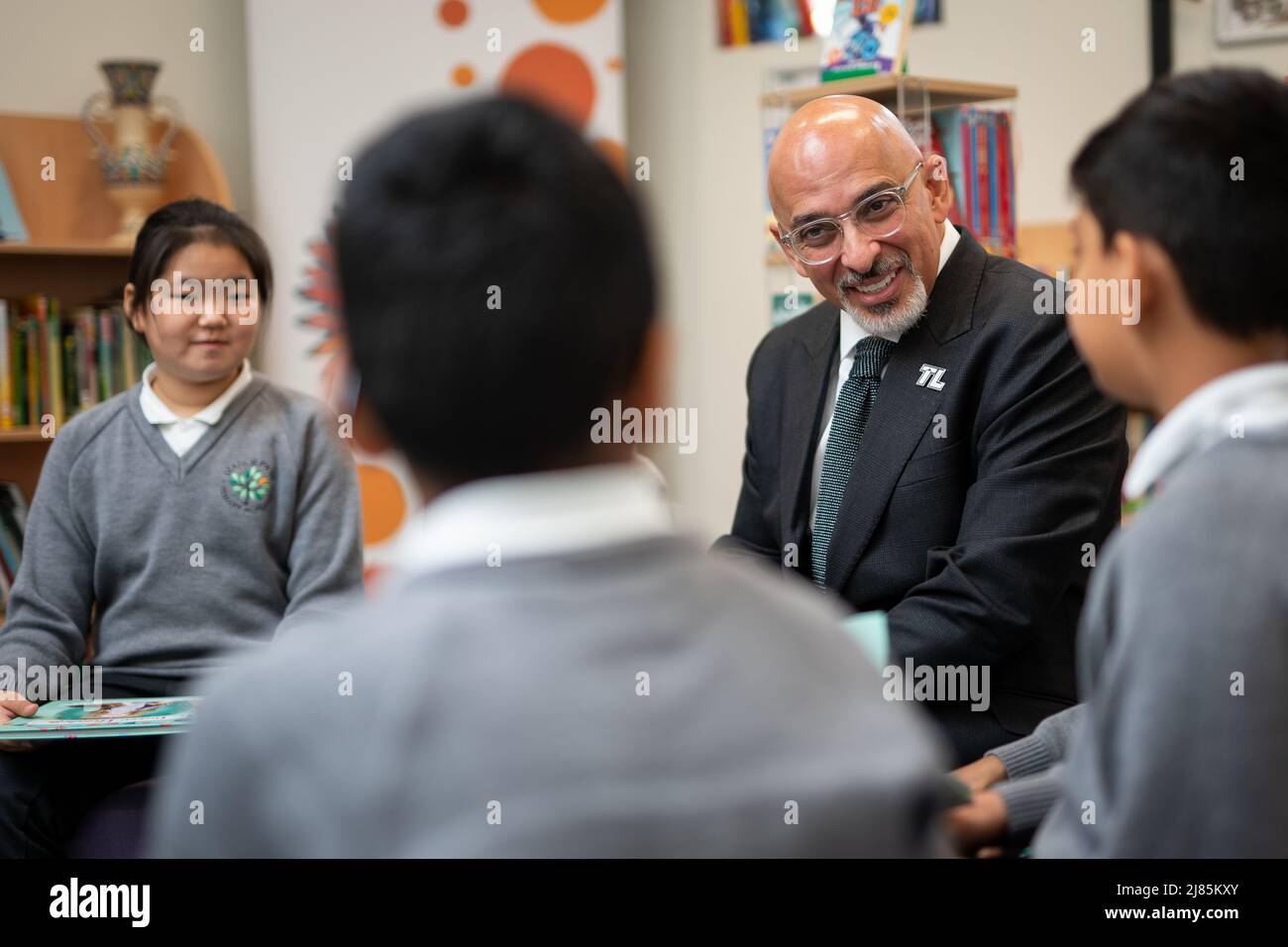 Education Secretary Nadhim Zahawi reads the commemorative Jubilee book ...