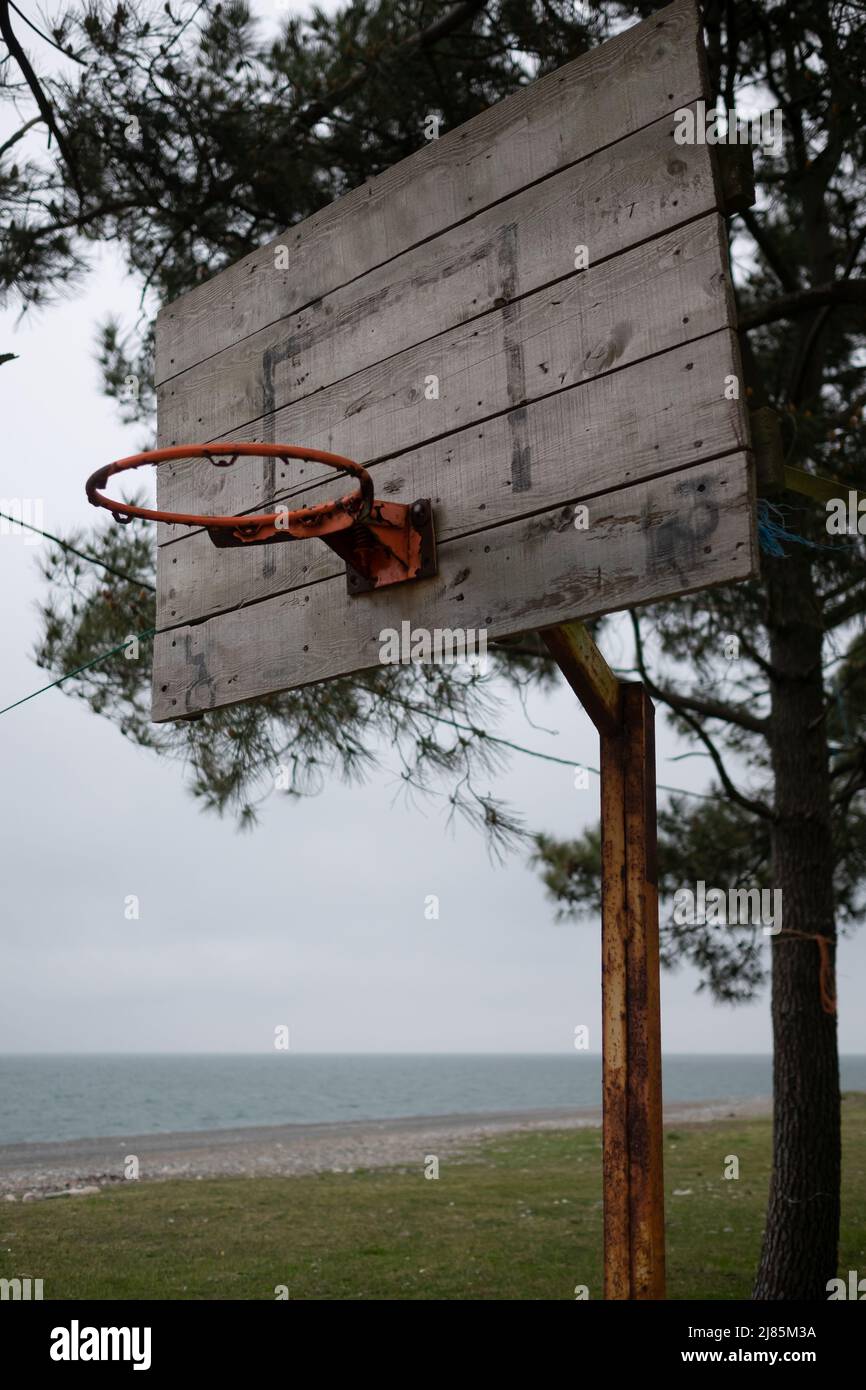 old basketball hoop without net in rural countryside. Play basketball ...