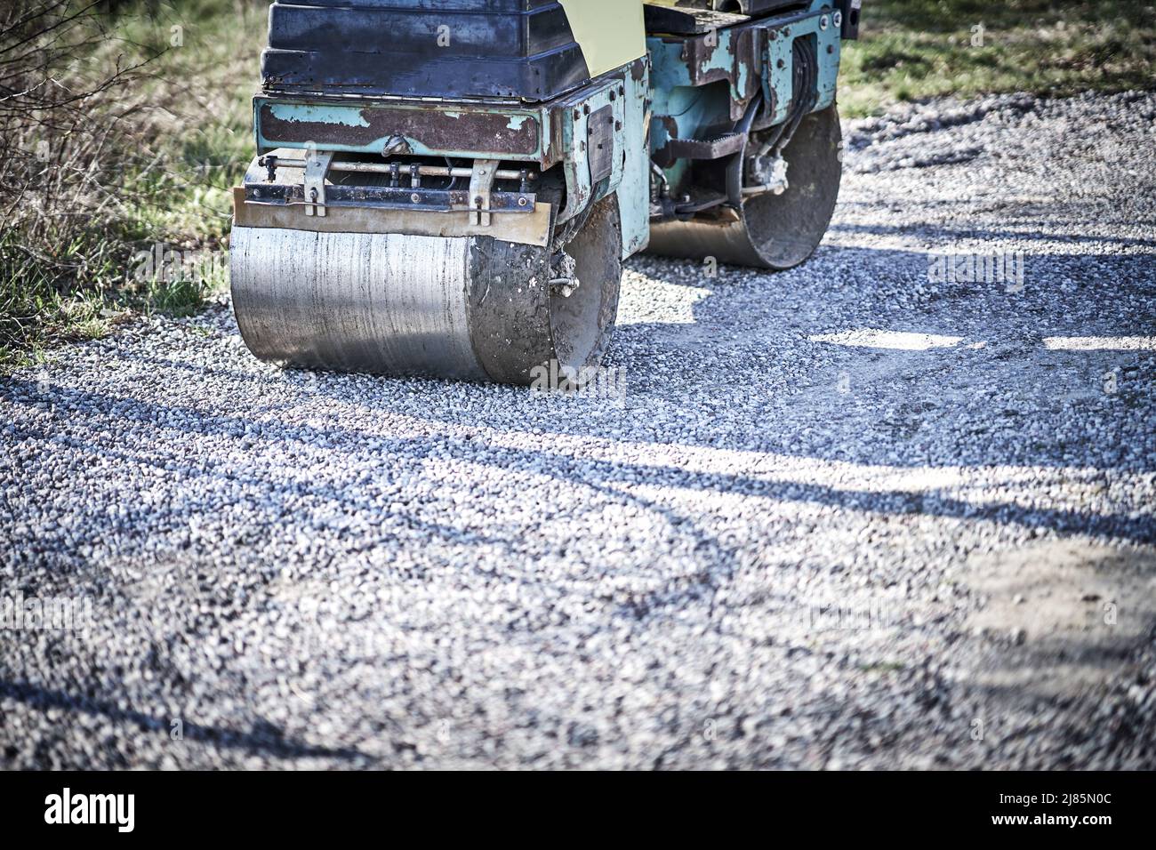 Picture of a road roller machine on the different surfaces Stock Photo ...