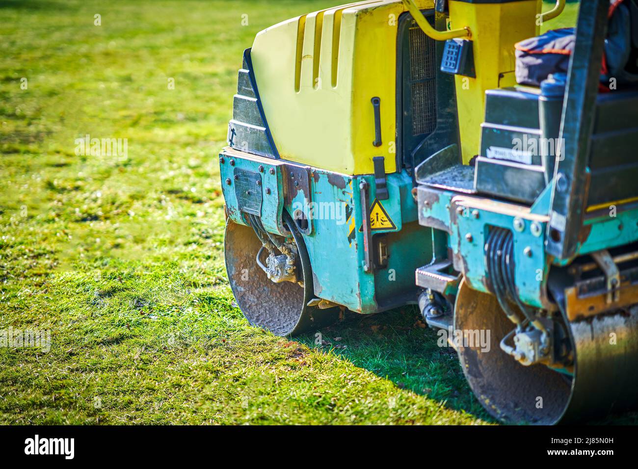 Picture of a road roller machine on the different surfaces Stock Photo ...
