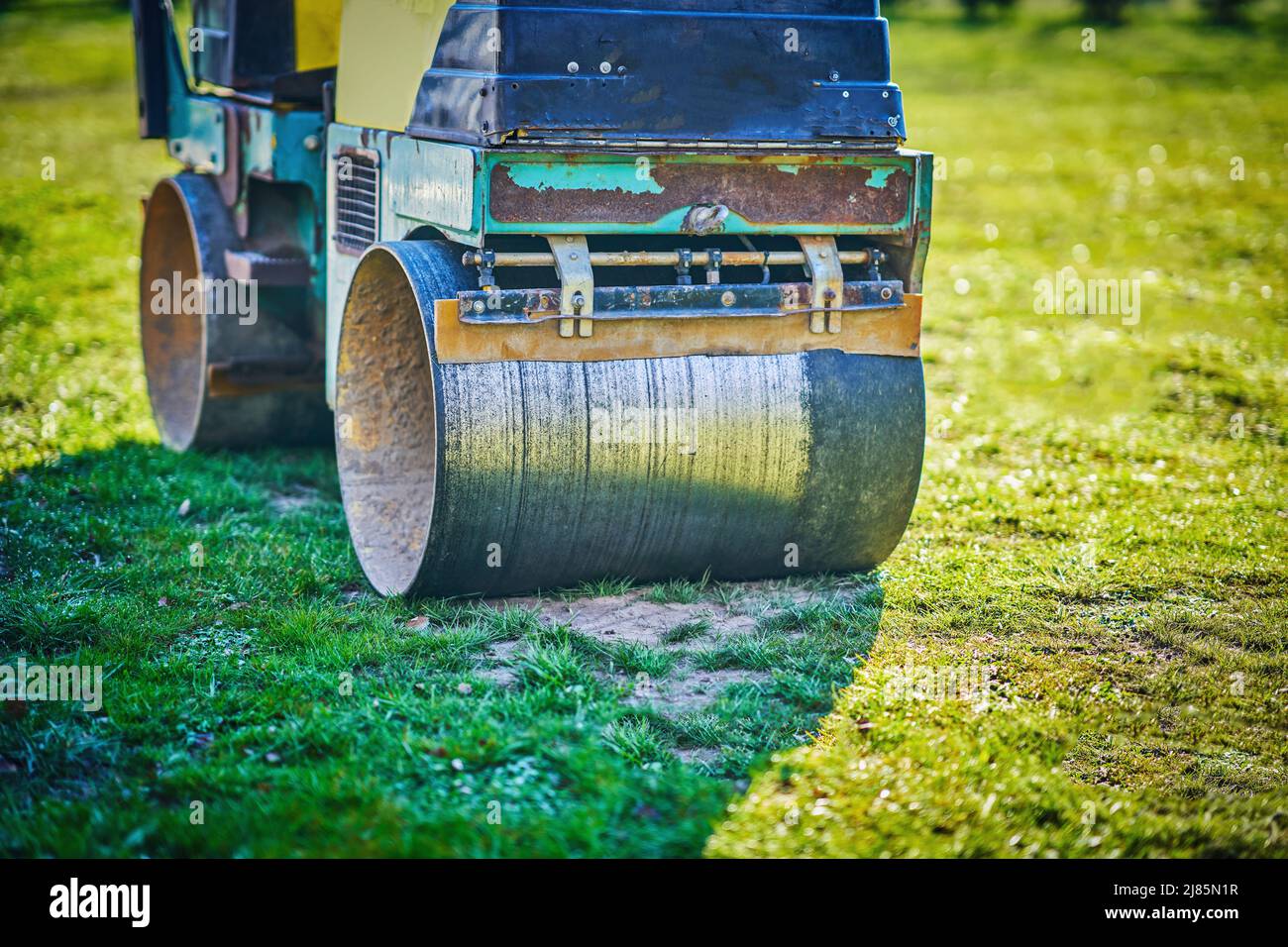 Picture of a road roller machine on the different surfaces Stock Photo ...
