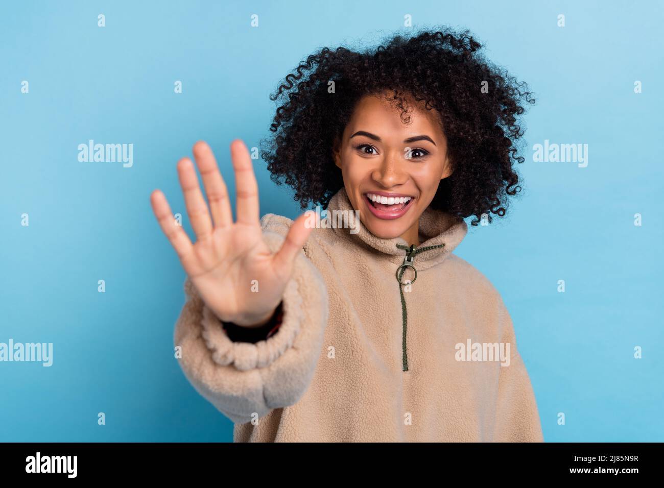 Hey you. Photo of funny lady wave hand clapping wear artificial fur ...