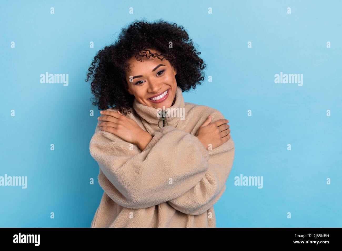 Photo of smiling lady cuddle herself enjoy cozy textile garment not ...