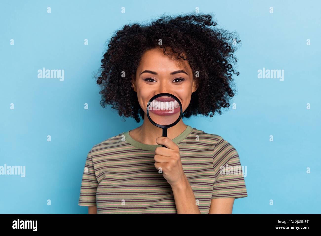 Photo Of Toothy Beaming Smiling Lady Use Magnify Glass Show Shiny Teeth