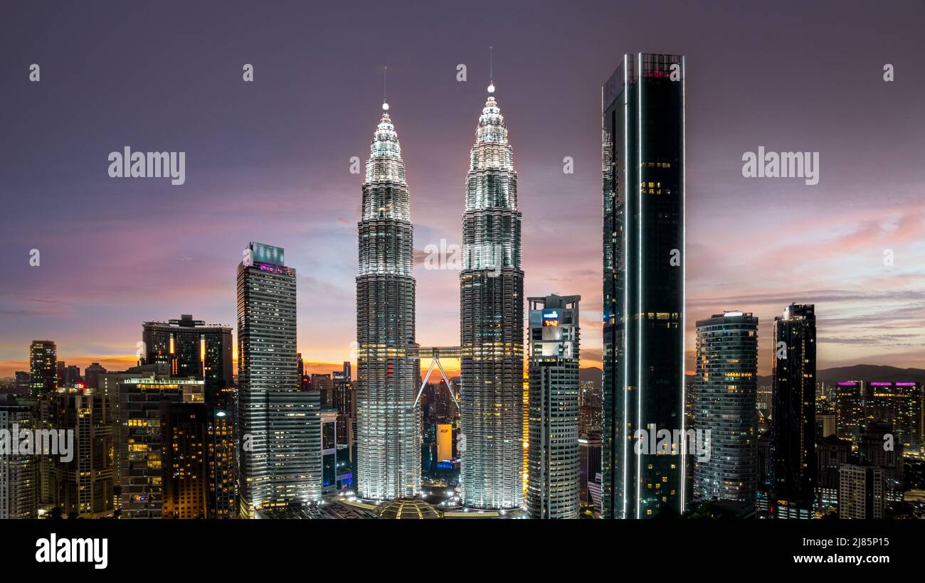 aerial view of the Kuala Lumpur city skyline in Malaysia during sunset ...