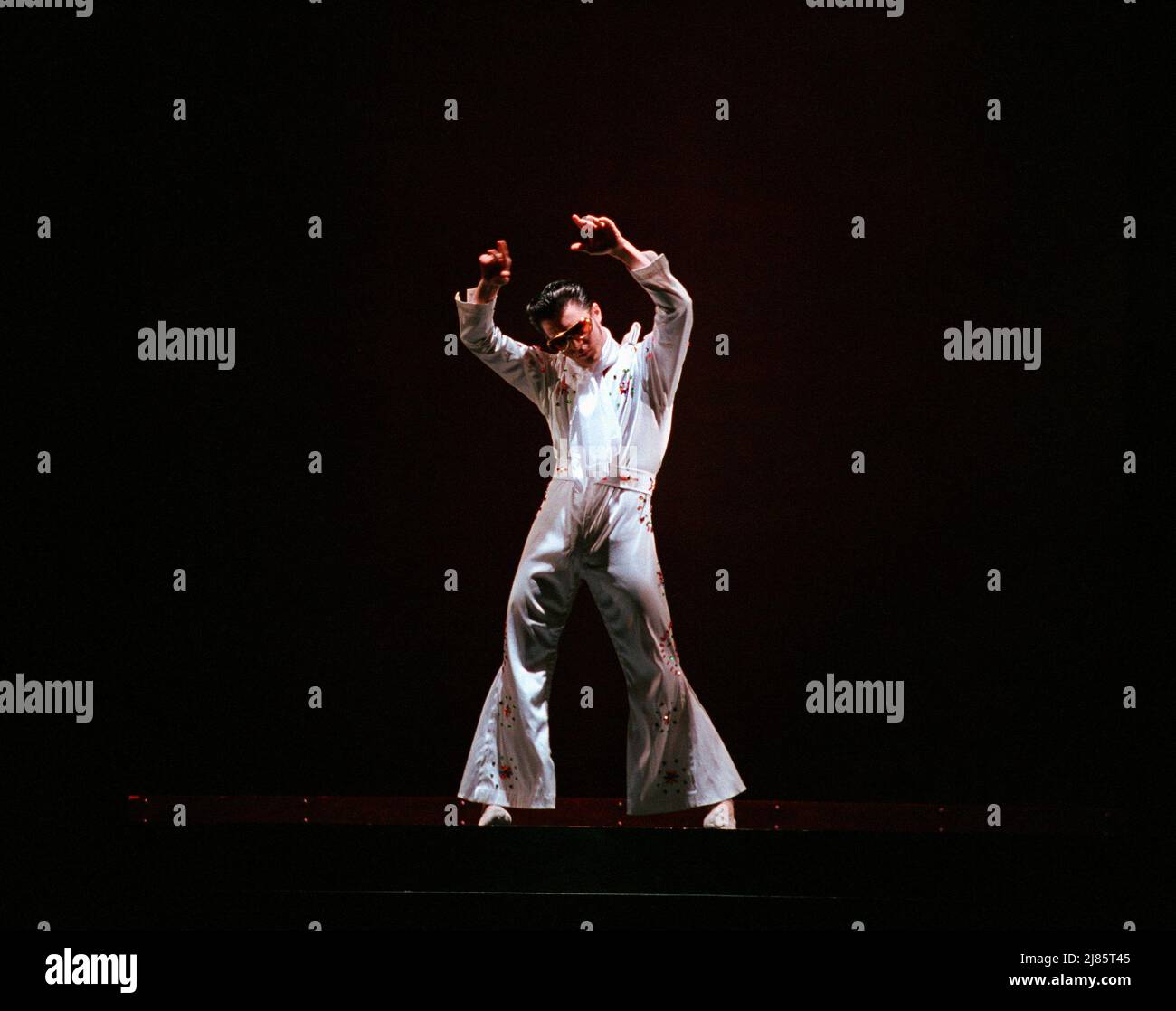 Solo dance in suit hi-res stock photography and images - Alamy