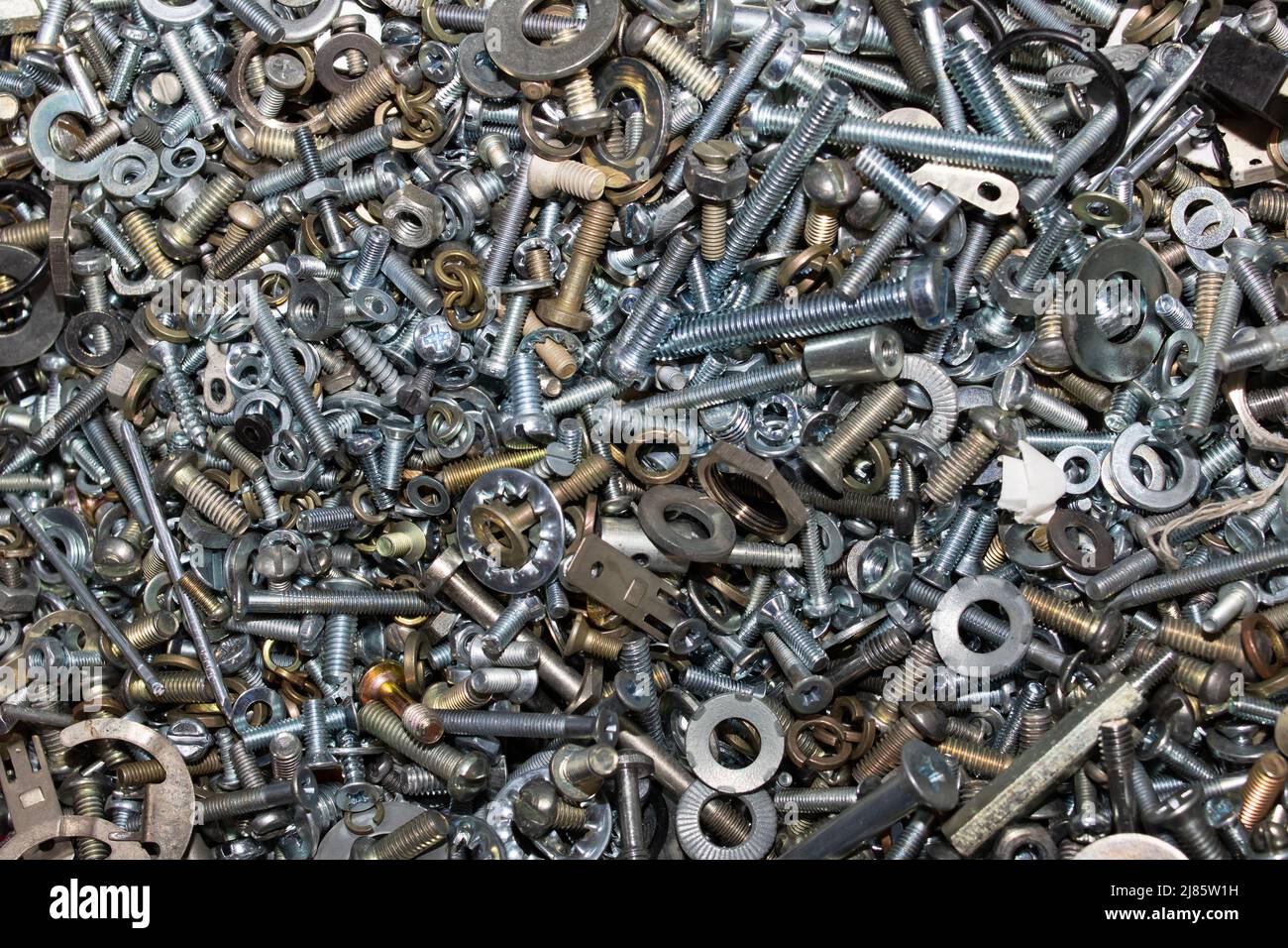Nuts and Bolts close up Background or texture Stock Photo - Alamy