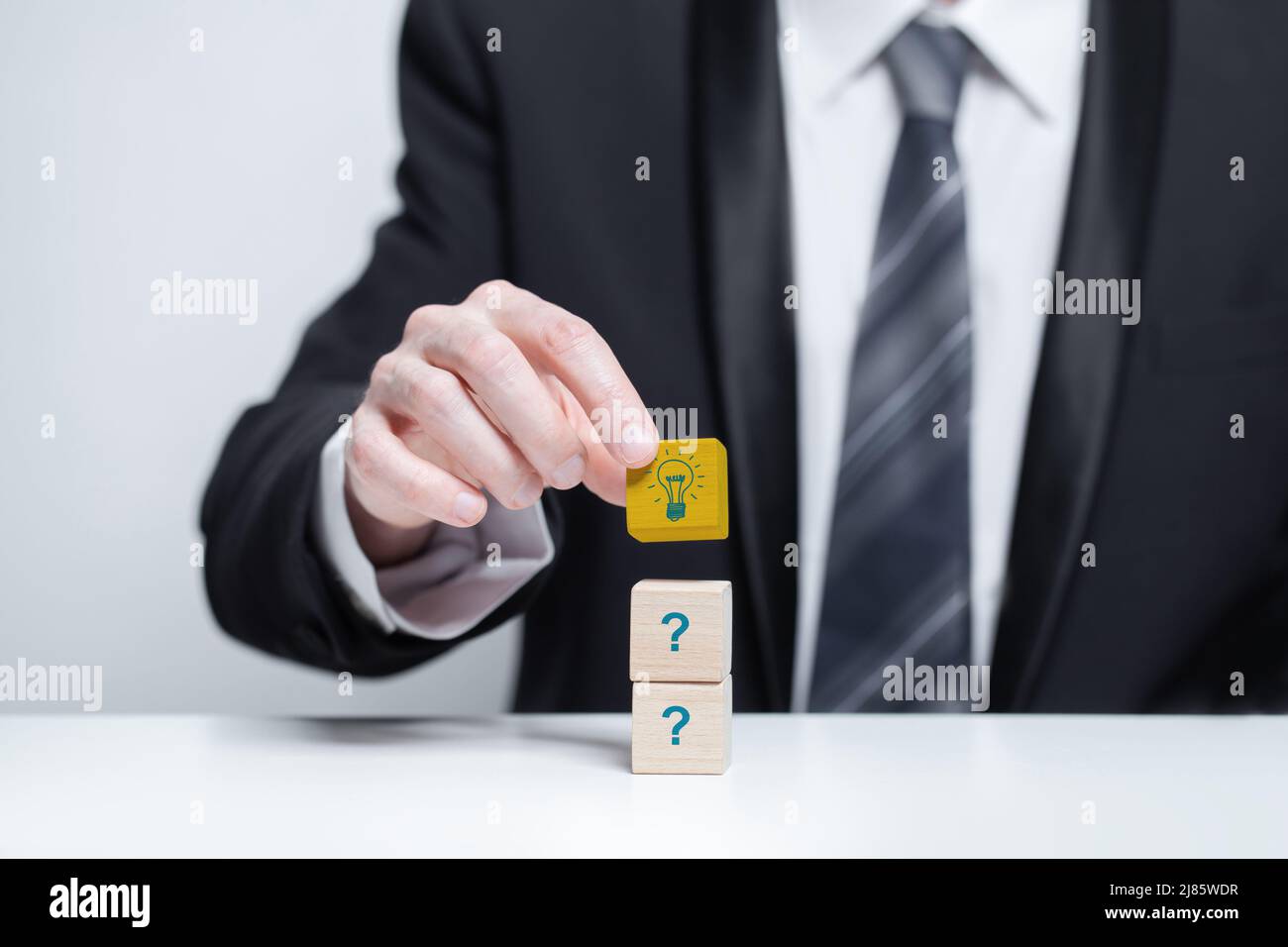 Businessman hand showing creative business strategy with light bulb ...