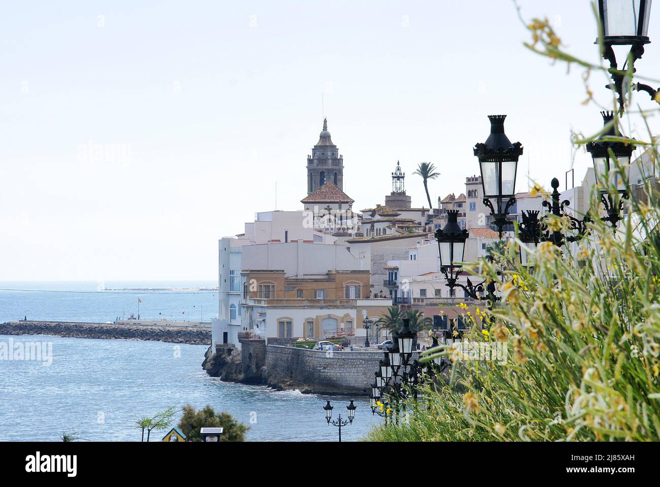 Panoramic view of Sitges with church of Sant Bartomeu and Santa Tecla ...