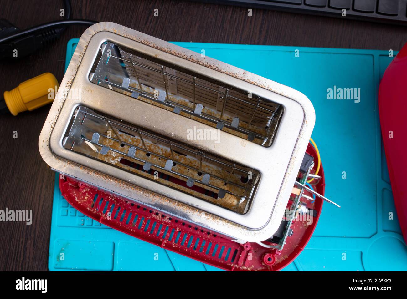 Parts of modern electric bread toster on the table close up Stock Photo ...