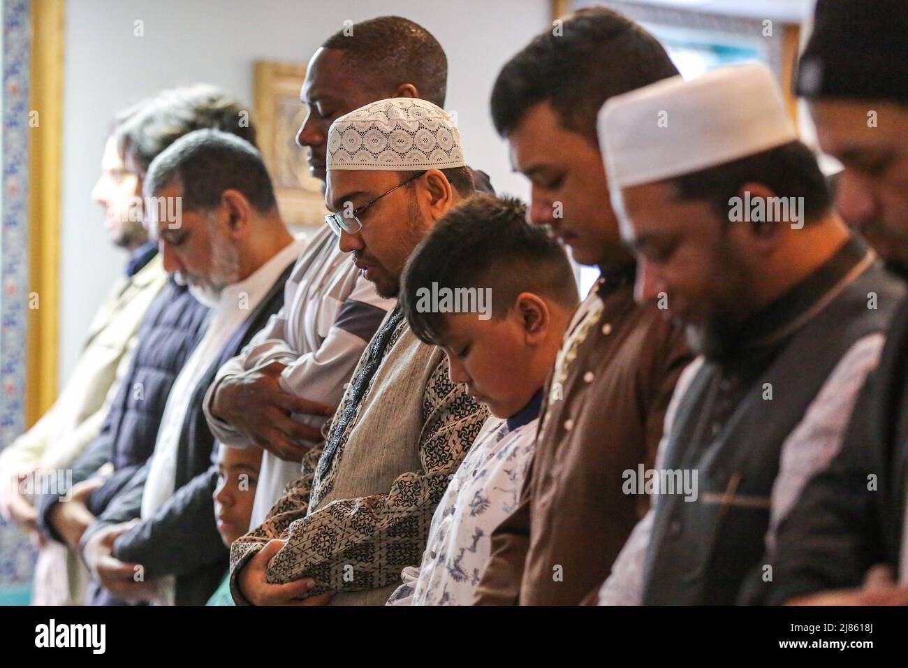 Muslims offer morning prayers at a mosque Stock Photo - Alamy