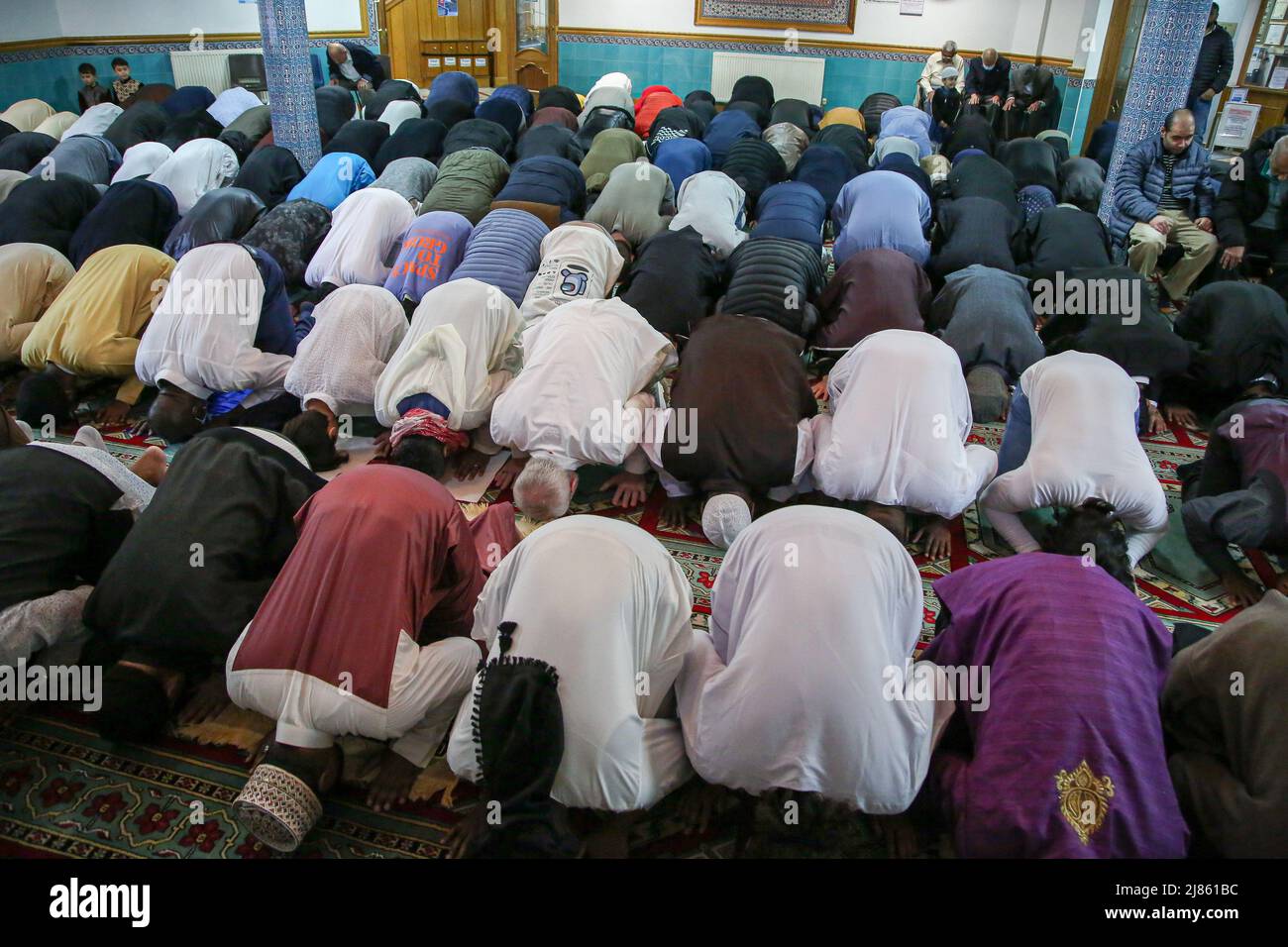 Muslims offer morning prayers at a mosque Stock Photo - Alamy