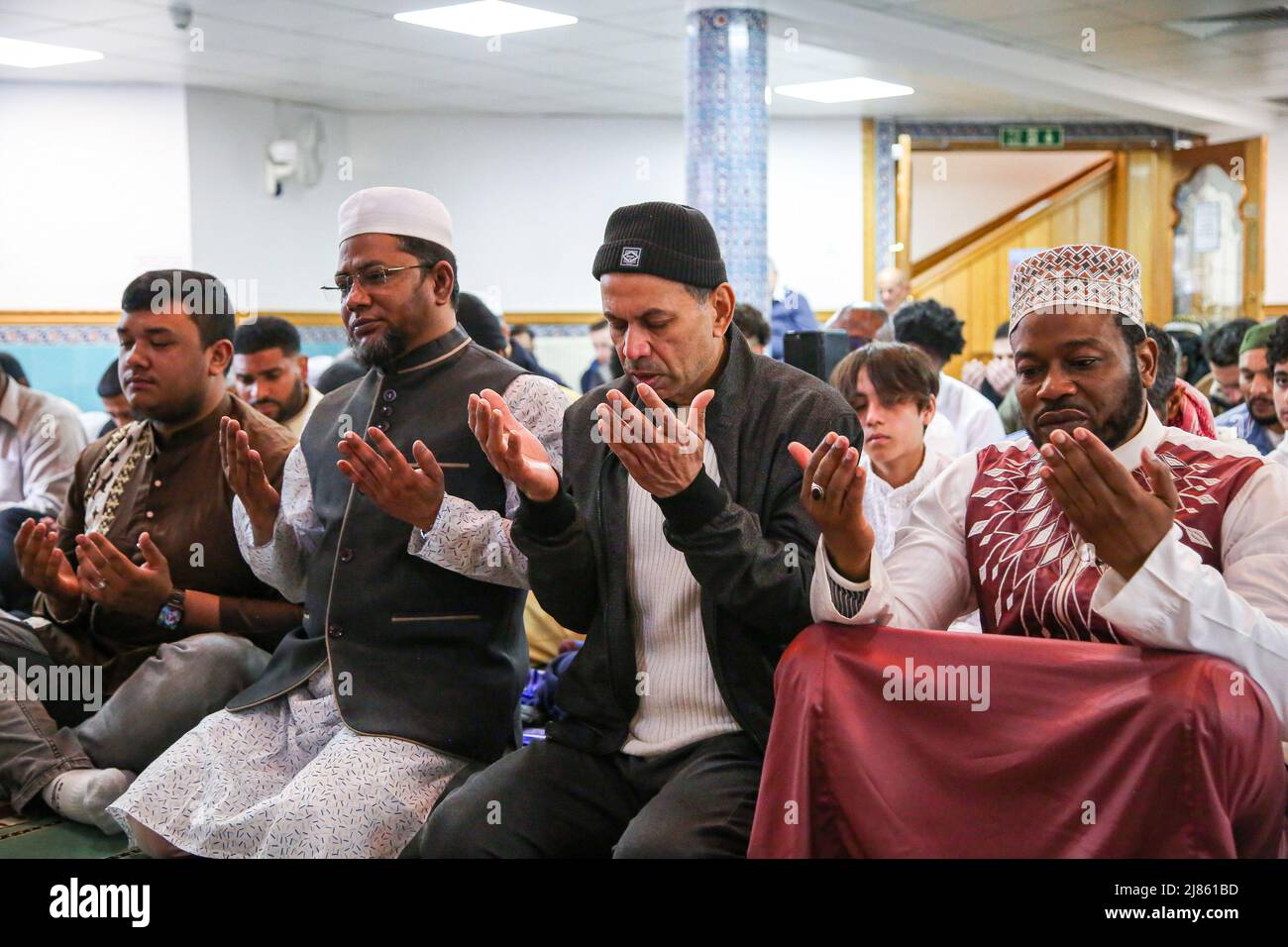 Muslims offer morning prayers at a mosque Stock Photo - Alamy