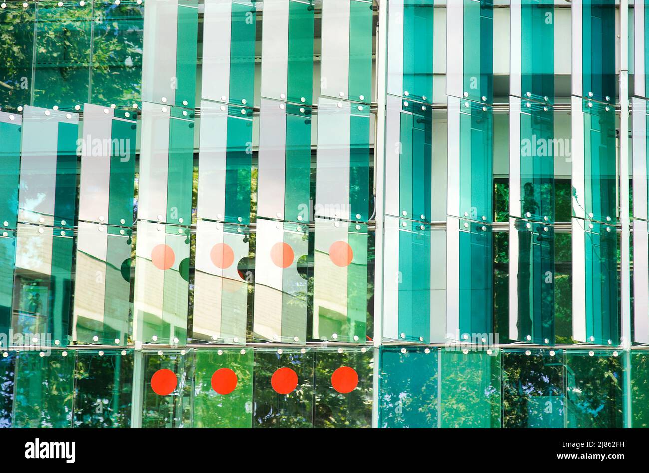 Green glass facade on a building in the Pueblo Nuevo district in ...