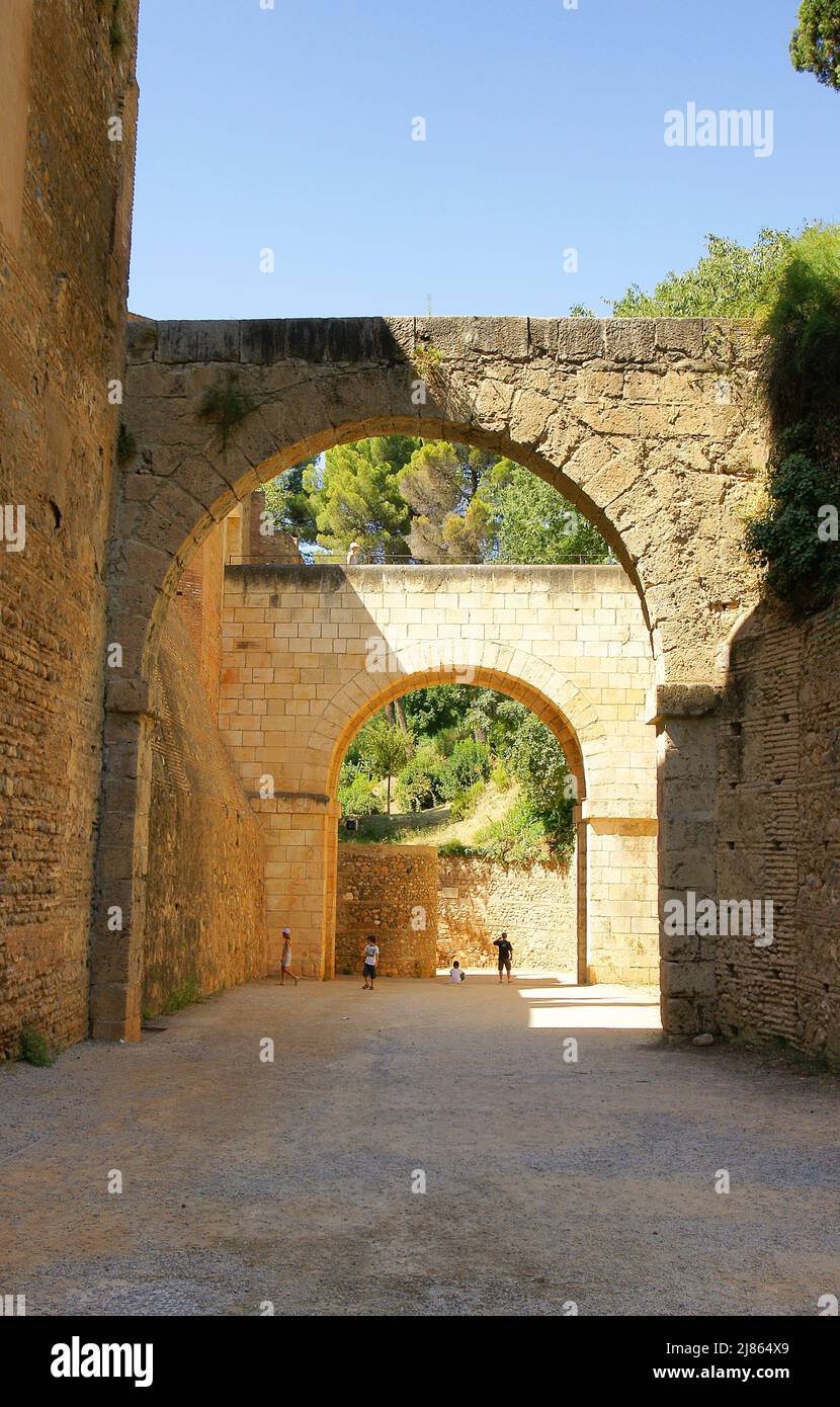 Arches of the buildings around the Alhambra in Granada, Spain, Europe ...
