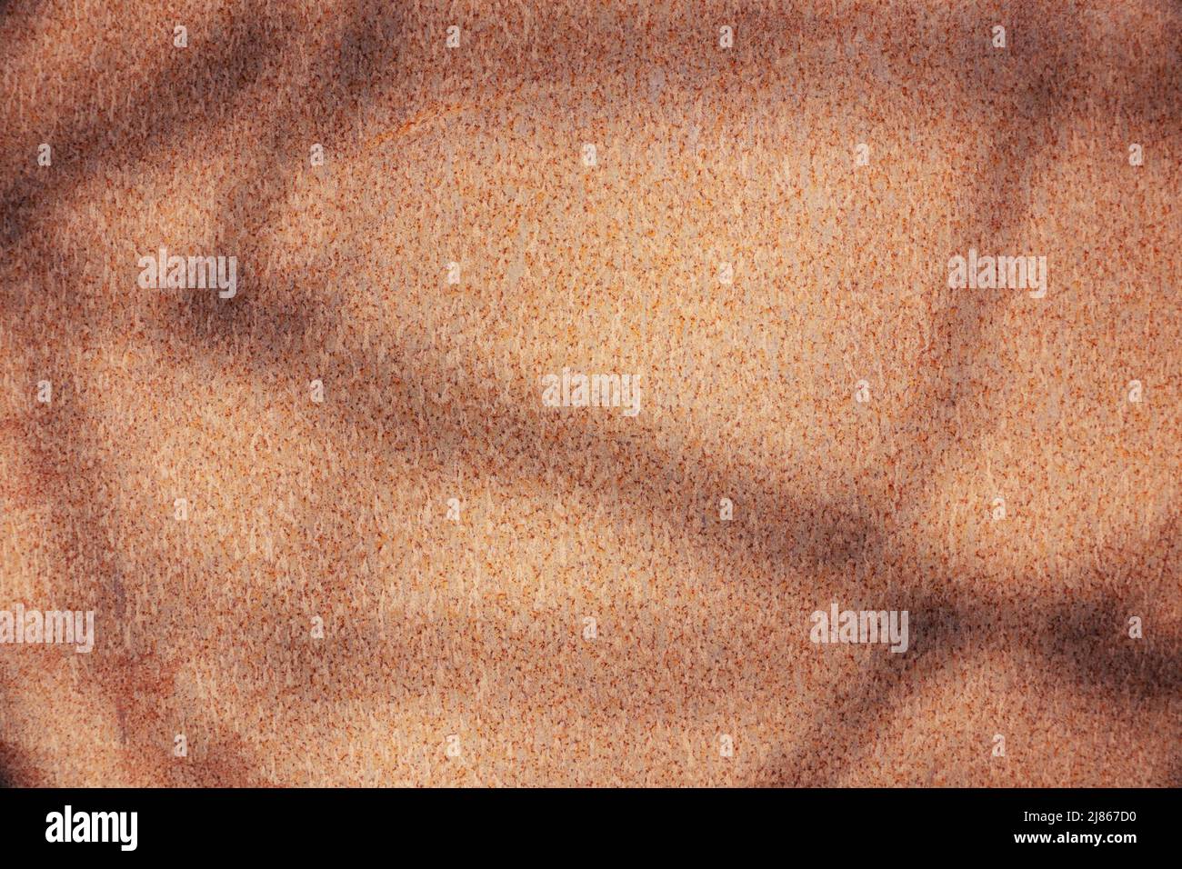 Rusty light orange metal background with shadows. Clean industrial ...