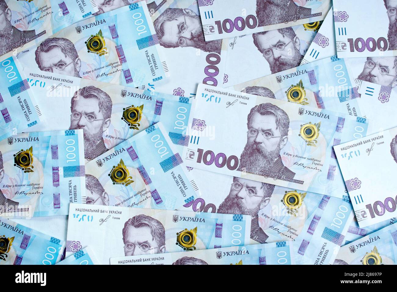 Background 1000 hryvnias. Money texture. Many Ukrainian hryvnias ...