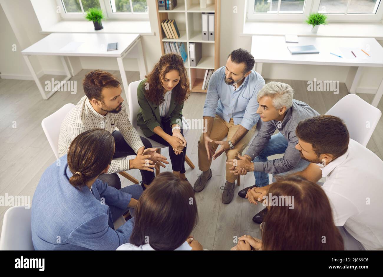 Group of women serious conversation hi-res stock photography and images ...
