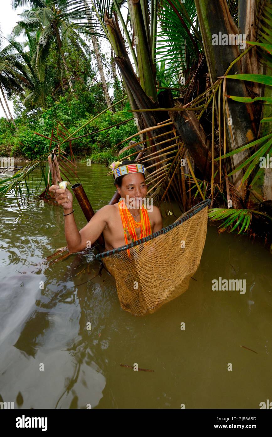 Fishing woman Mentawai Siberut island. Sumatra, Indonesia Stock Photo ...