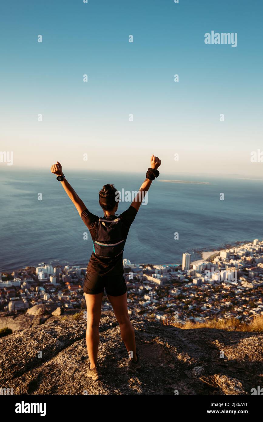 Woman young arms open mountain hi-res stock photography and images - Alamy